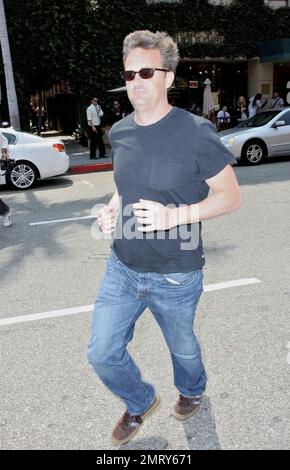 Matthew Perry must be in a hurry as he runs from the Beverly Hills ...