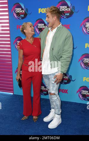 Jake Paul, right and his mother Pam Stepnick arrive at the Teen Choice ...