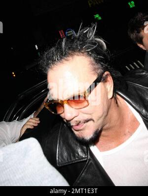Academy Award-nominated actor Mickey Rourke leaves the nightclub My ...