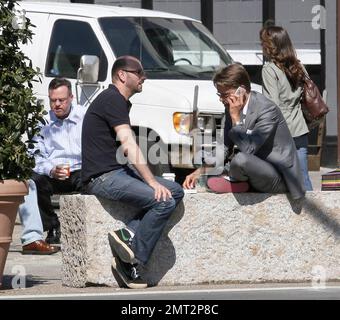 Exclusive!! Moby takes a meeting with a friend sitting on a wall in ...