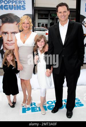 Dina Waters, Director Mark Waters, and children arrive at the premiere ...