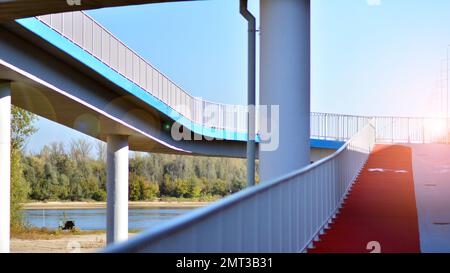 Bicycle path and sidewalk through the highway bridge Stock Photo - Alamy