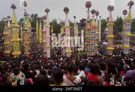 Indian Pnar or Jaintia tribesmen carry 'Rongs' or chariots through ...
