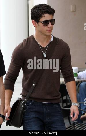 EXCLUSIVE!! Nick Jonas out window shopping in Beverly Hills, CA. 5/8/11 ...