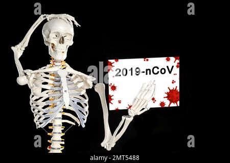 Artificial human skeleton with illustration of virus on black ...