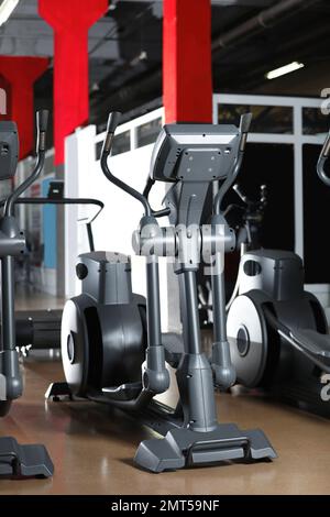 Elliptical trainer in gym. Modern sport equipment Stock Photo - Alamy