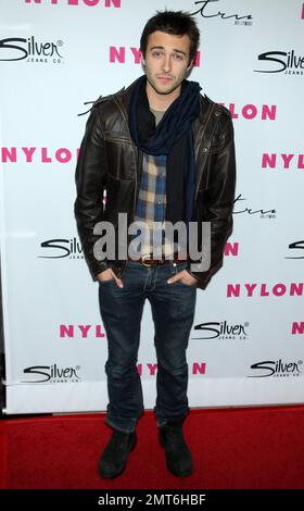 Actor Reese Thompson poses for photographers on the red carpet at NYLON ...