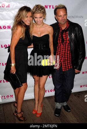 Guest with AnnaLynne McCord and Marvin Jarrett attend the NYLON ...