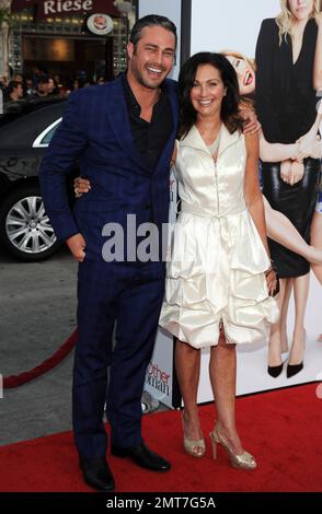 Taylor Kinney with his mother at the Los Angeles premiere of "The Other ...