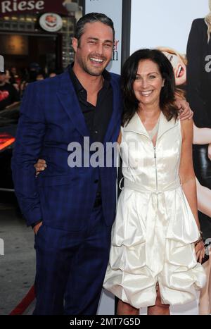 Taylor Kinney with his mother at the Los Angeles premiere of "The Other ...