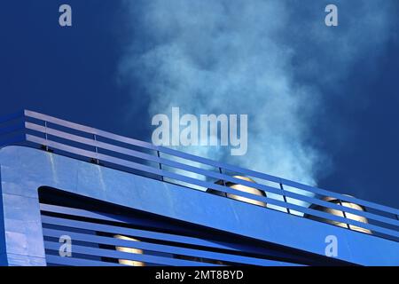 Smoke rising from cruise ship funnel Stock Photo - Alamy