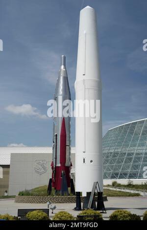 A Convair SM-65 Atlas intercontinental ballistic missile, right, a ...
