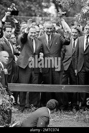 Soviet Premier Alexei Kosygin, left, speaks from behind the seal of the ...