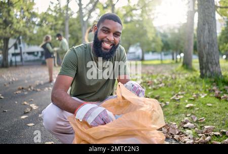 Cleaning, recycle and portrait of black man at beach for plastic ...