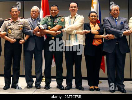 Malaysian Chief Secretary to the Government Mohd Zuki Ali walks during ...