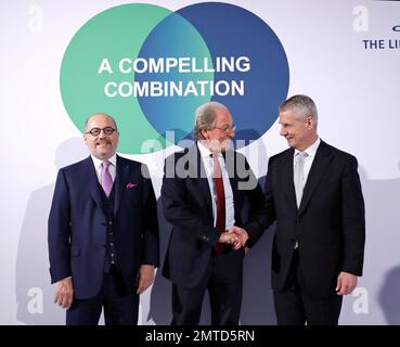 Linde CEO Aldo Belloni, left, and Praxair CEO Steve Angel pose for a ...