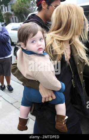 Rachel Zoe carries her son Skyler while out shopping in Beverly Hills ...