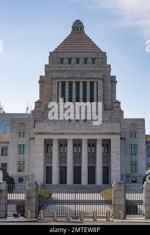 Tokyo, Japan: c. 1936. Japanese troops waving flags and banners as they ...