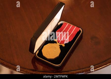 The Queen Consort is presented with the Canadian Forces' Decoration by ...