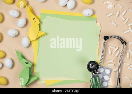 Happy and healthy Easter - medical mockup with stethoscope and pills ...