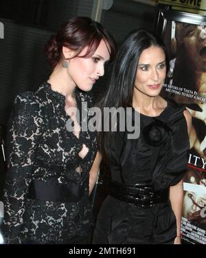 Rumer Willis and Mom Demi Moore pose together on the red carpet at the ...