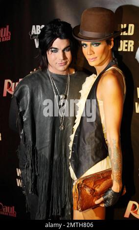 In a leather fringe poncho, leather bellbottoms and blue eye makeup ...