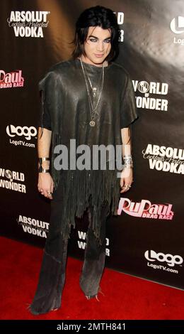 In a leather fringe poncho, leather bellbottoms and blue eye makeup ...