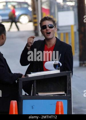 EXCLUSIVE!! Ryan Phillippe flashes a peace sign as he arrives for an ...