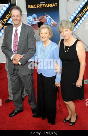 Penny Chenery (C) and guests walk the red carpet at the world premiere ...