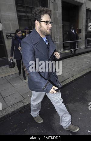Seth Rogen makes some funny faces as he leaves BBC Radio 1 after an ...