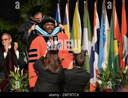 Shaquille O'Neal receives a doctoral degree in education from Barry ...
