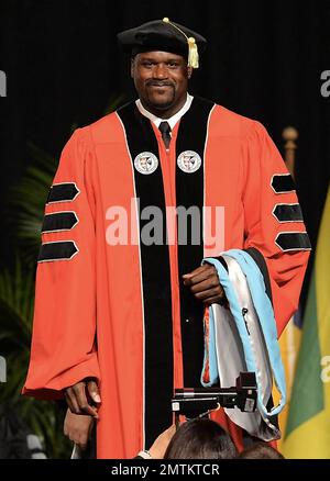 Shaquille O'Neal receives a doctoral degree in education from Barry ...