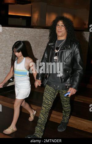 Exclusive!! Slash with daughter walking through The Palms casino after ...
