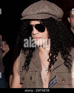 Legendary musician Slash (aka Saul Hudson) shows off his tattoos in a ...