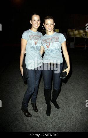 Amy Smart and Anne Getty wear matching t shirts that say "Vote Your ...