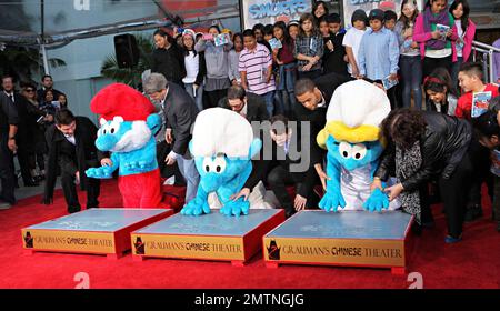 Papa Smurf, Bob Osher, Clumsy, Smurfette and Anton Yelchin at The ...