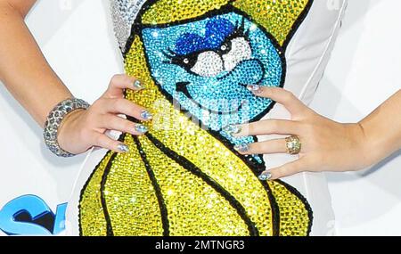 Katy Perry looks stunning in a Smurfette dress at the Word Premiere of ...