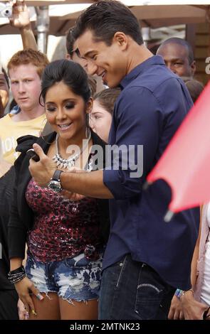 Wearing a typical outlandish Jersey-style outfit, "Jersey Shore" star ...