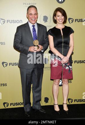 CBS national correspondent Jim Axelrod, left, and producer Ashley Velie ...