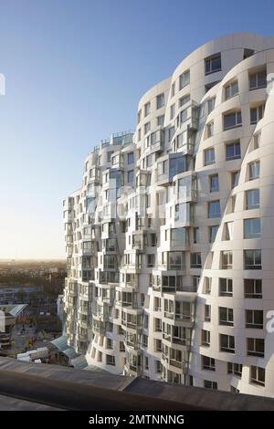Rippled exterior facade of Prospect Place. Prospect Place Battersea ...
