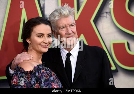 David Lynch, at right, and his wife, Emily Stofle arrives at the ...
