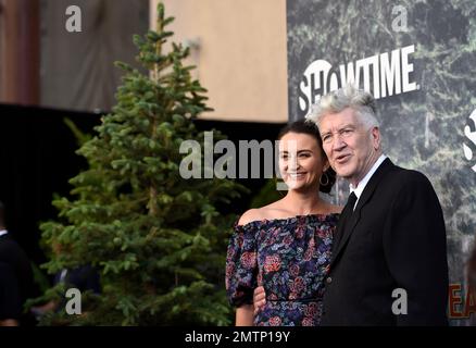 David Lynch, at right, and his wife, Emily Stofle arrives at the ...