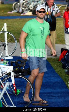David Denman takes part in the Nautica South Beach Triathlon. Miami ...