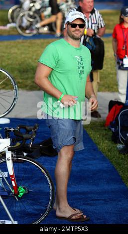 David Denman takes part in the Nautica South Beach Triathlon. Miami ...