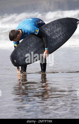 Surfer ride waves in slow motion at Las Canteras beach in Las Palmas de ...