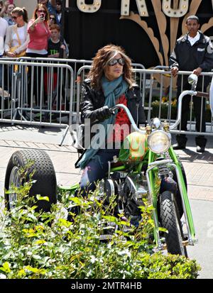 Steven Tyler arrives on a custom motorcycle tricycle at the press ...
