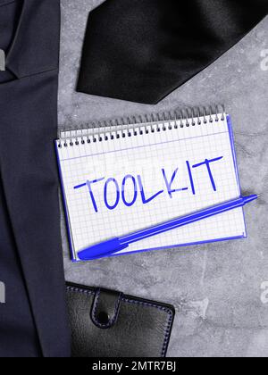 Text caption presenting Toolkit. Word Written on set of tools kept in a ...