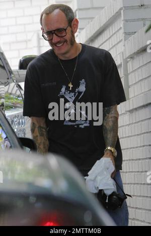 American fashion and portrait photographer Terry Richardson walking in ...