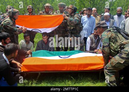 An Indian army cover coffin with Indian flag during wreath lying ...