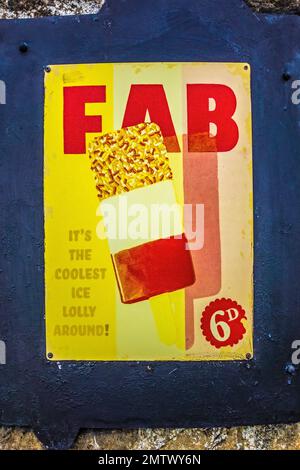Fab ice lolly on a blue background Stock Photo - Alamy